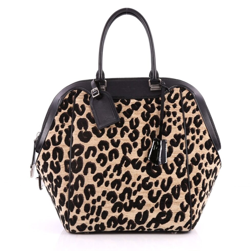 Louis Vuitton 101: Behind Their Brand & Artist Collaborations | The Vault